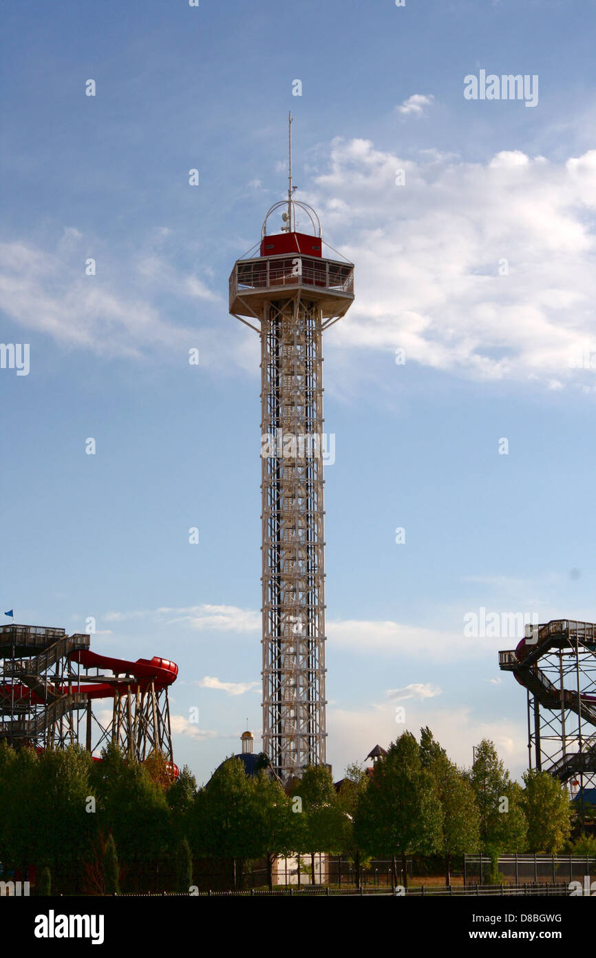 A lookout tower stands tall against the sky, offering a panoramic view ...