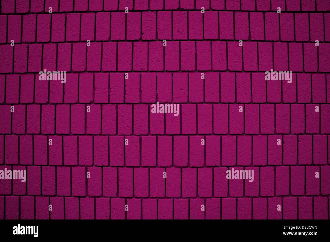 magenta brick wall texture with vertical bricks Stock Photo - Alamy
