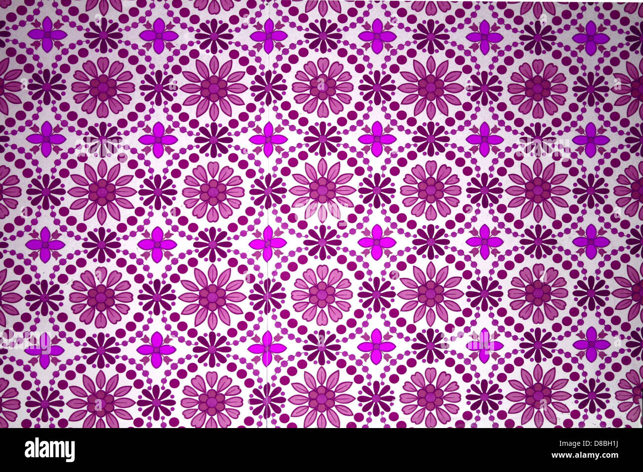 A textured wallpaper featuring vibrant magenta flowers arranged in a ...
