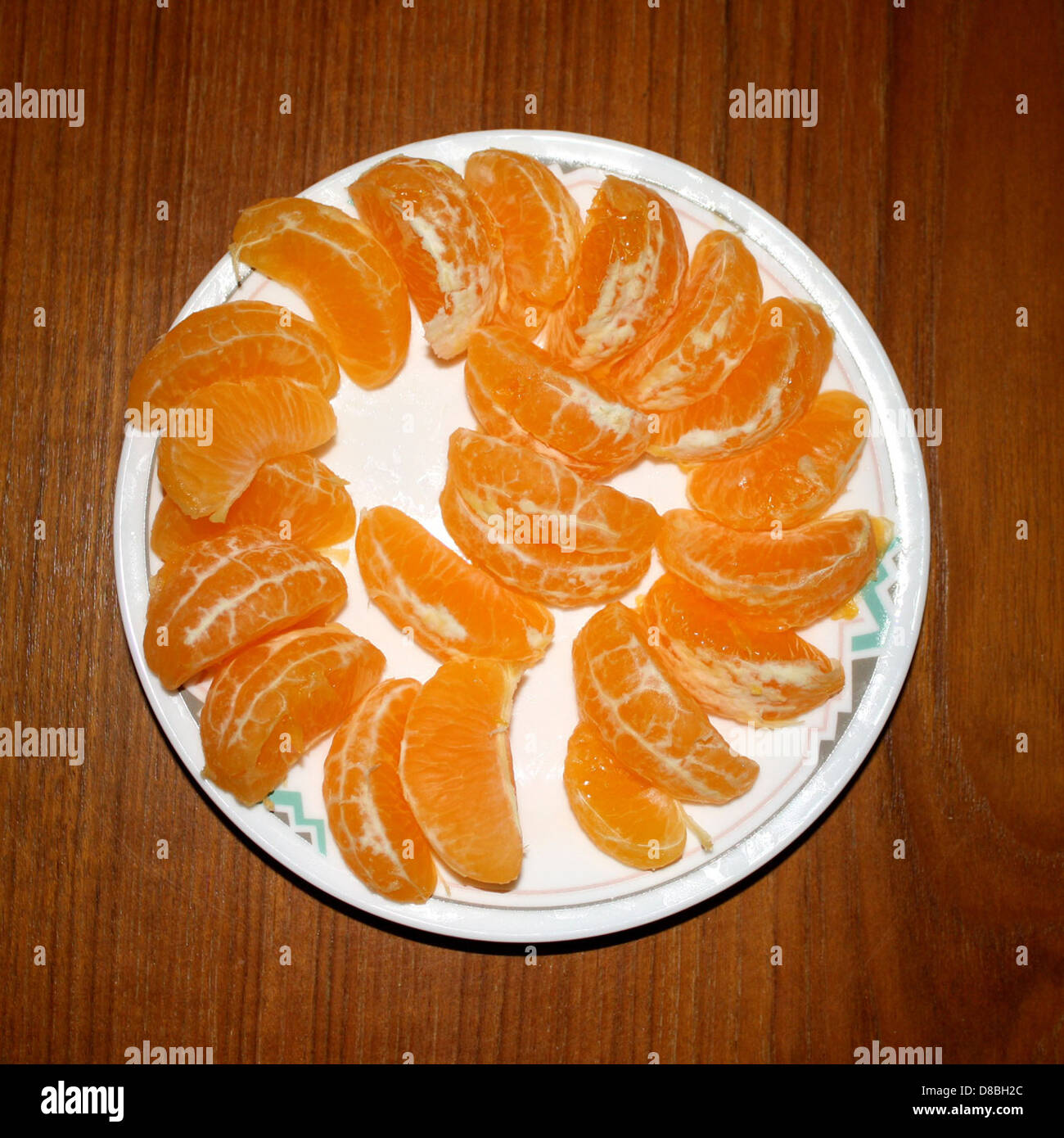 A close-up image of mandarin orange sections, revealing the juicy ...