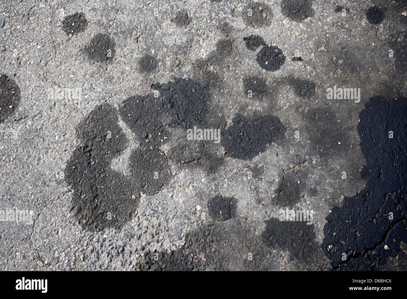 oil stained asphalt texture Stock Photo - Alamy