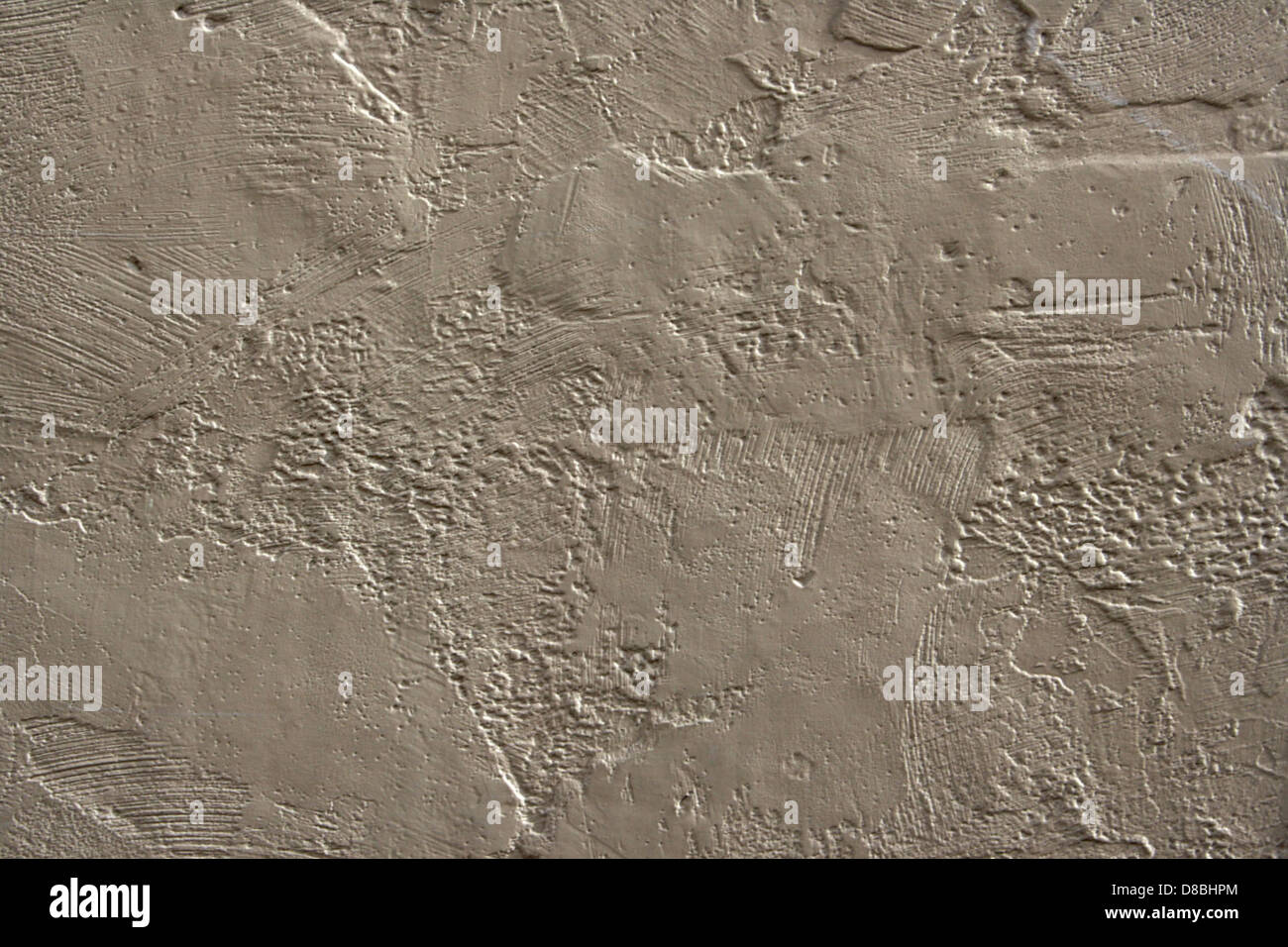 A close-up view of painted stucco texture, showcasing the smooth ...