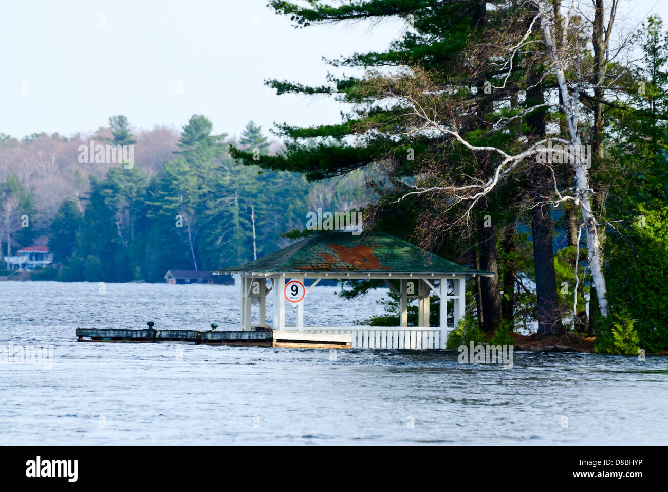 Covered shelter on a dock Stock Photo - Alamy