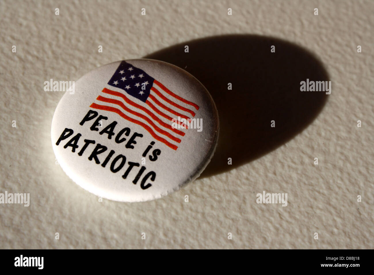 A button with the words 'Peace is Patriotic,' symbolizing the ...