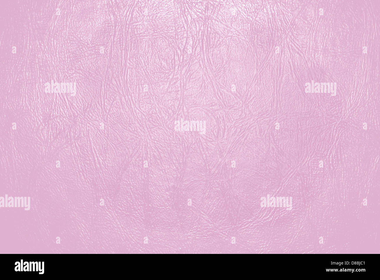 A close-up view of pink leather, showcasing the texture, grain, and ...