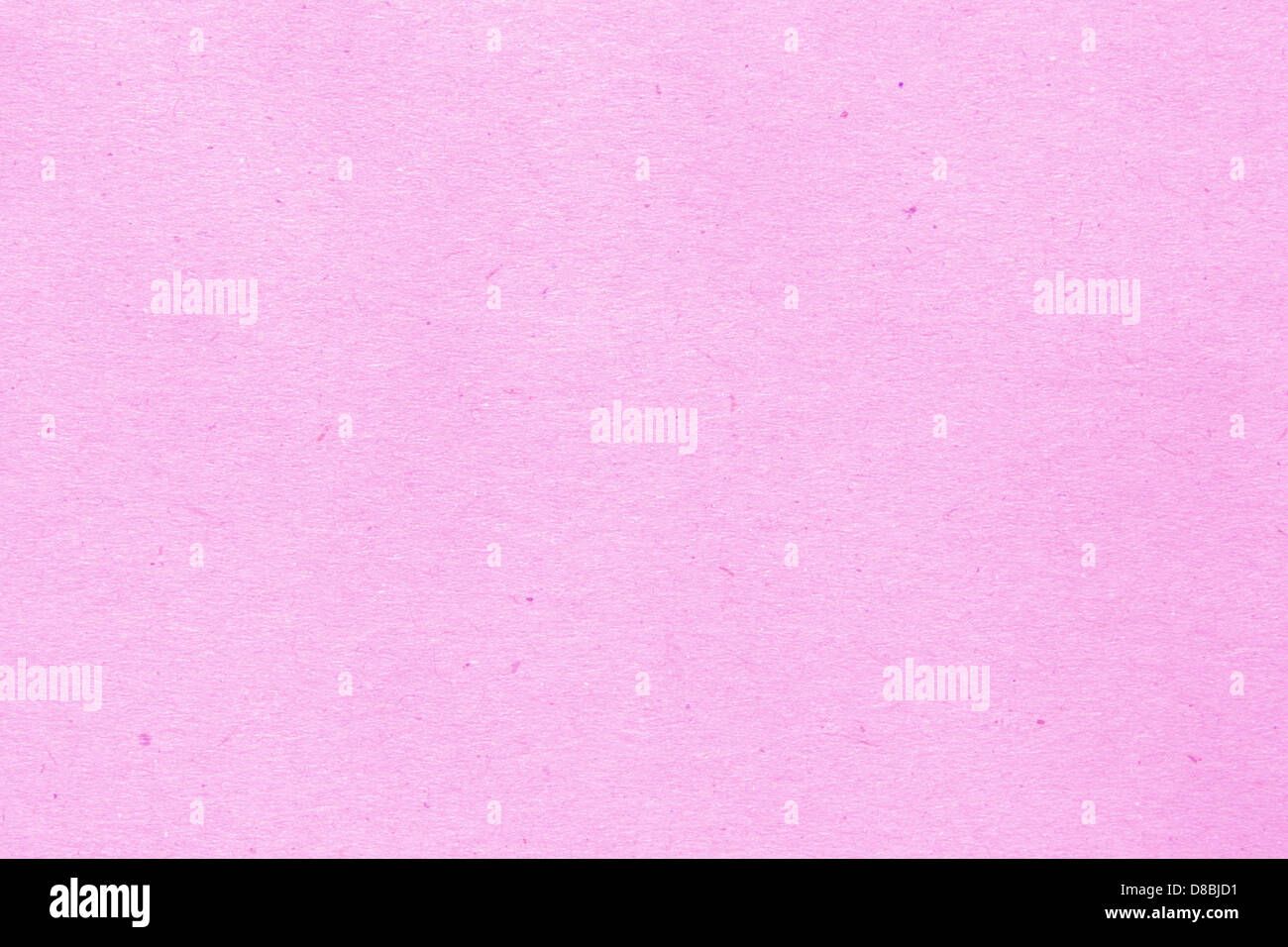 A soft pink paper texture with flecks scattered across the surface ...