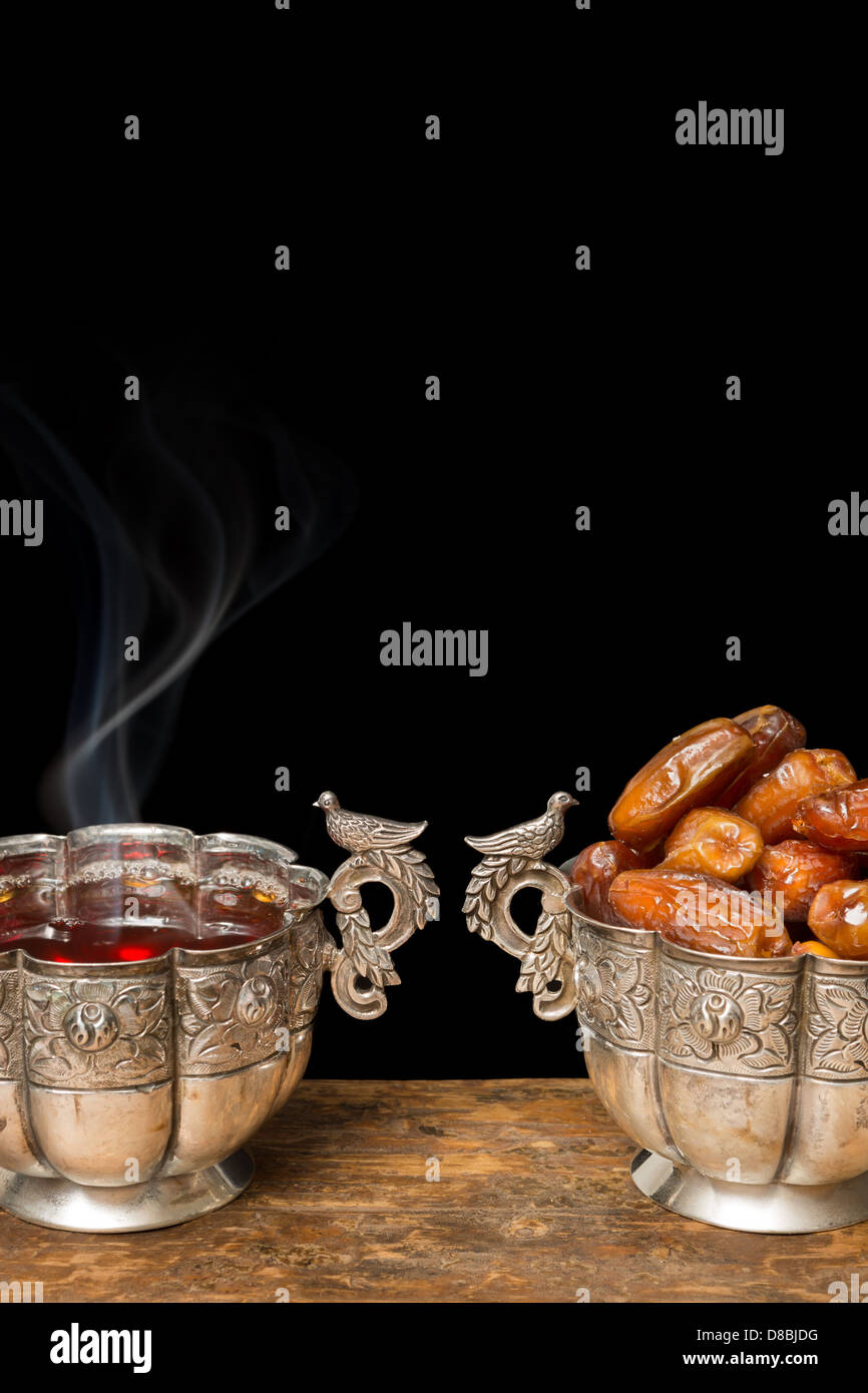 Bowl of dates as eaten during ramadan period Stock Photo - Alamy