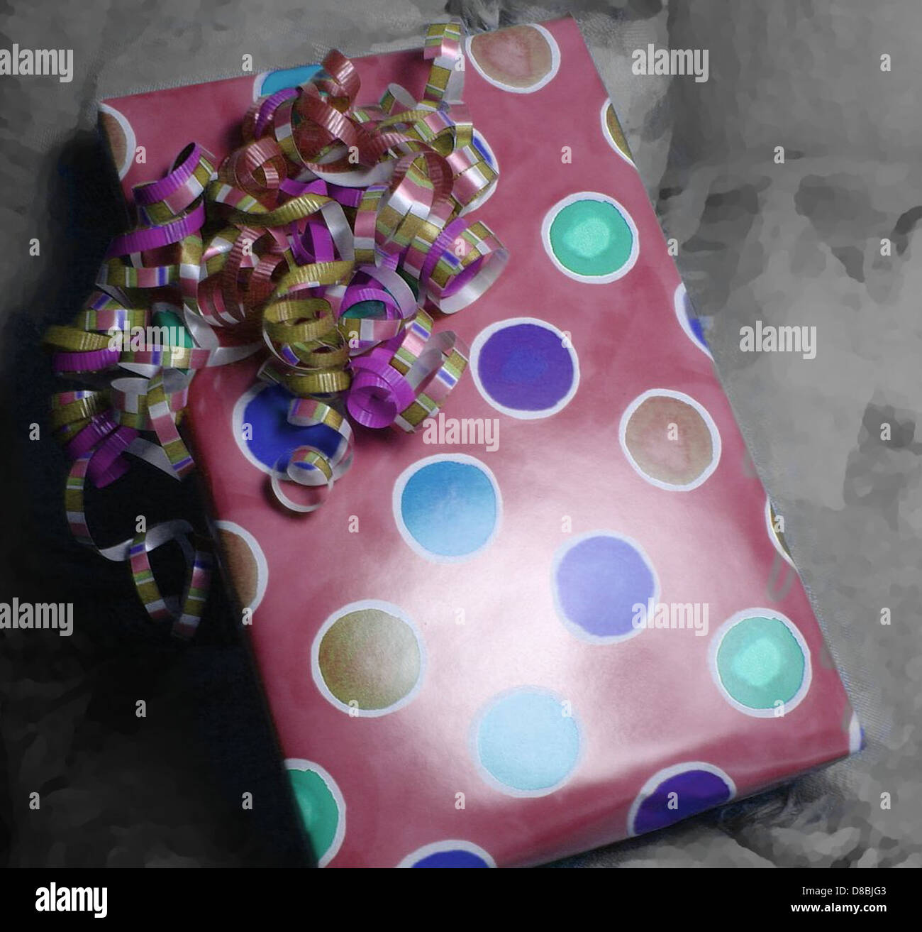 A simple yet elegant pink package sits against a neutral monochrome ...