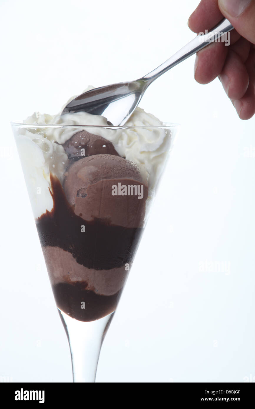 Hand scooping ice cream hi-res stock photography and images - Alamy