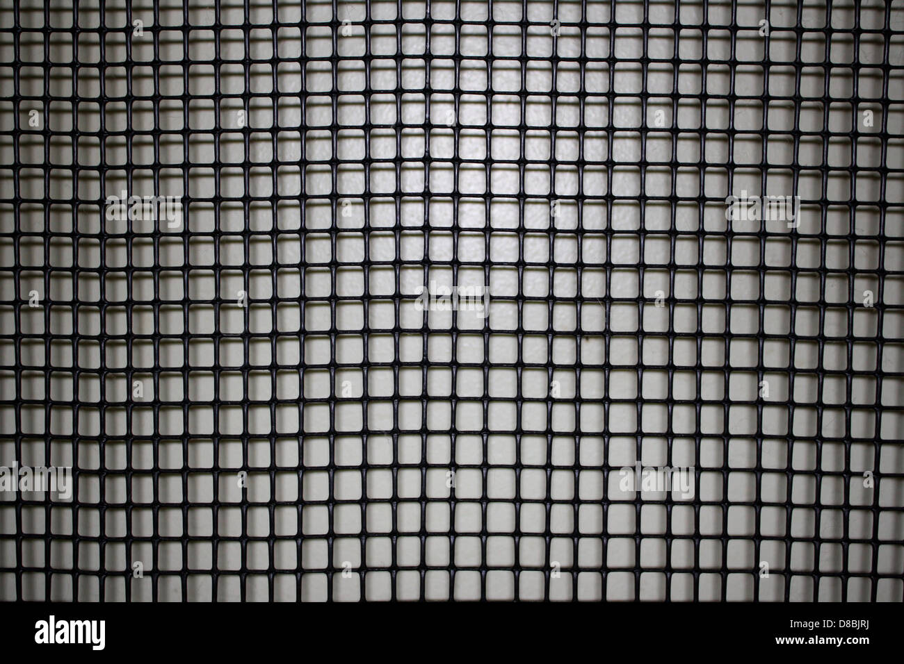 A close-up image of a plastic screen texture, showcasing its fine weave ...