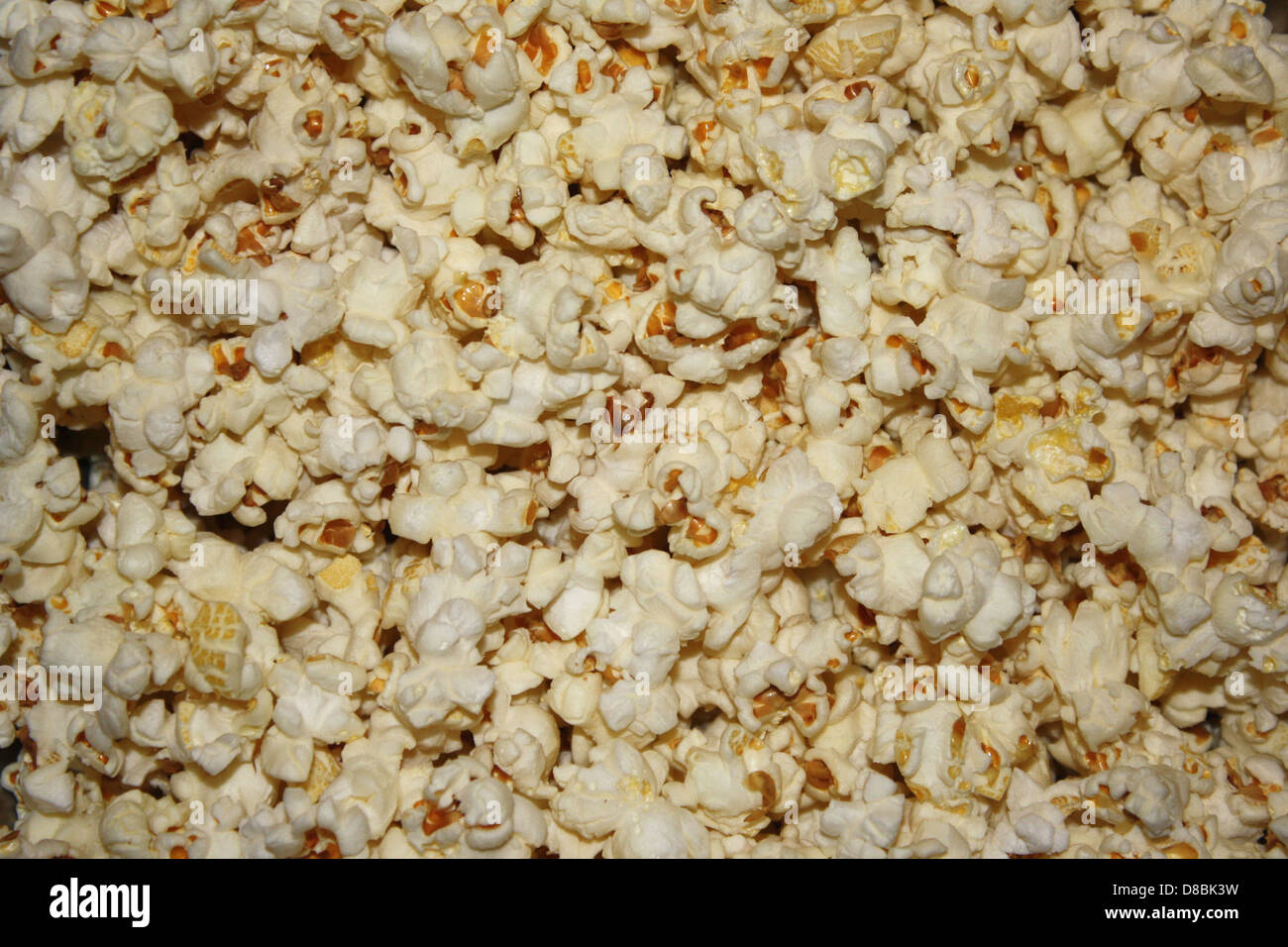 This image shows the texture of popcorn, highlighting the fluffy ...