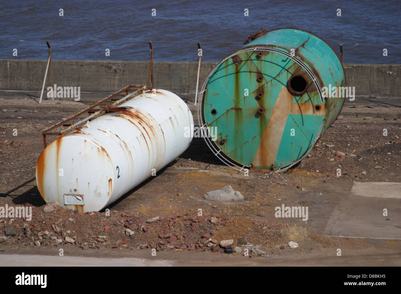 Old, rusty Storage Tanks near the coast Stock Photo - Alamy