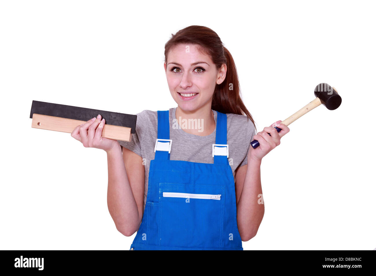 female worker holding hammer Stock Photo - Alamy