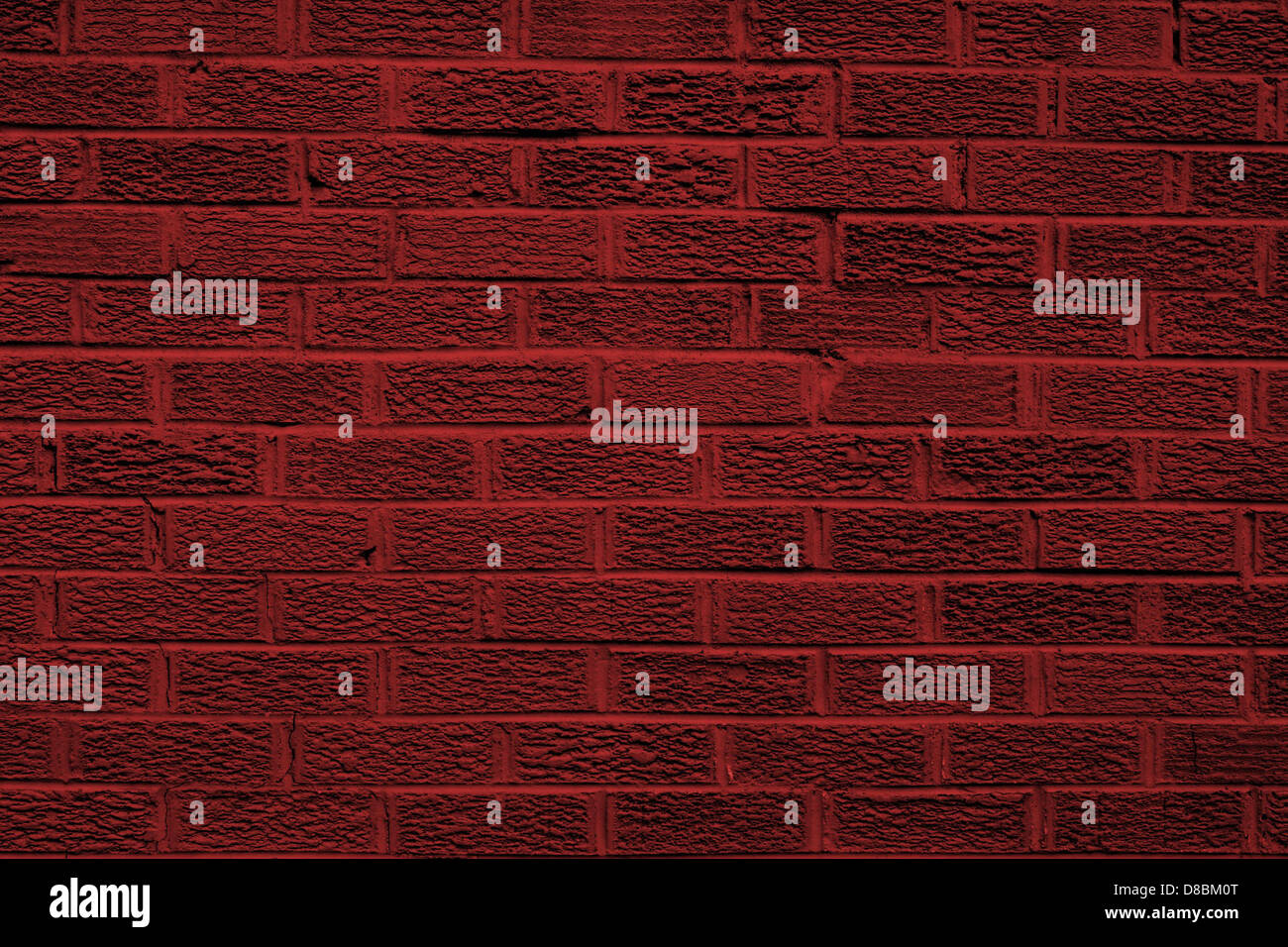 Close-up image of a textured red brick wall, showcasing the individual ...
