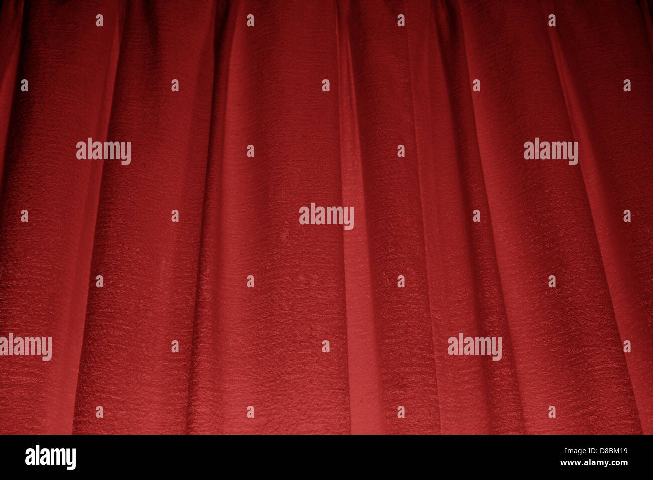 A set of red curtains with a rich texture, adding a dramatic and ...