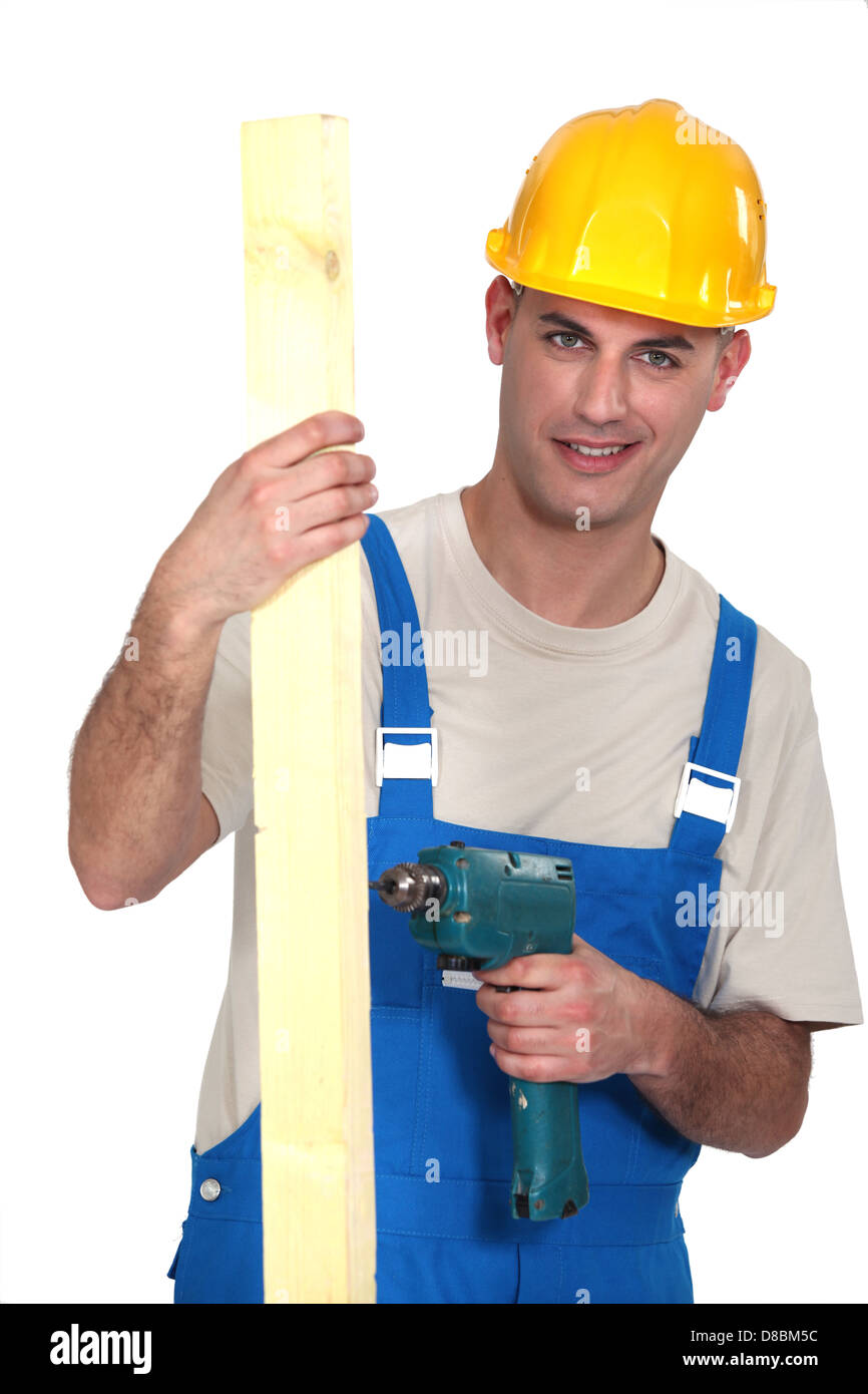 craftsman working with a drill Stock Photo - Alamy