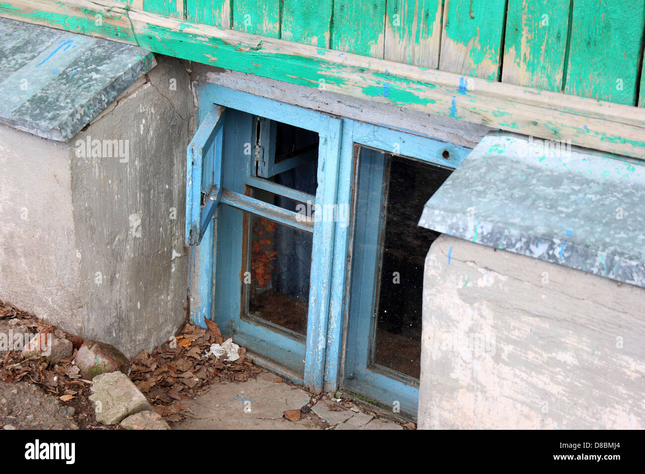 small window in the basement of a wooden house Stock Photo - Alamy