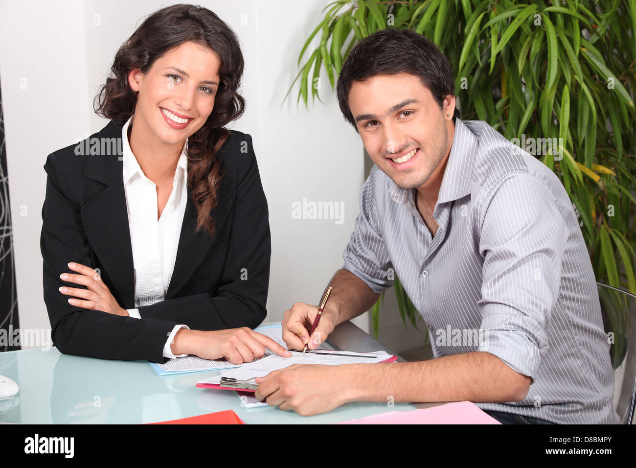 Customer signing contract agreement Stock Photo - Alamy