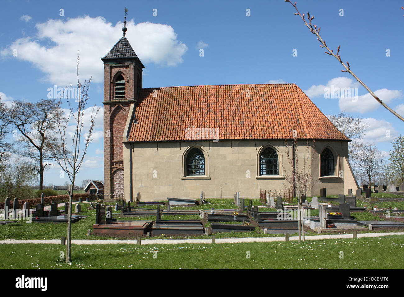 Small church with graveyard from 1648 in Dorkwerd.The Netherlands Stock ...