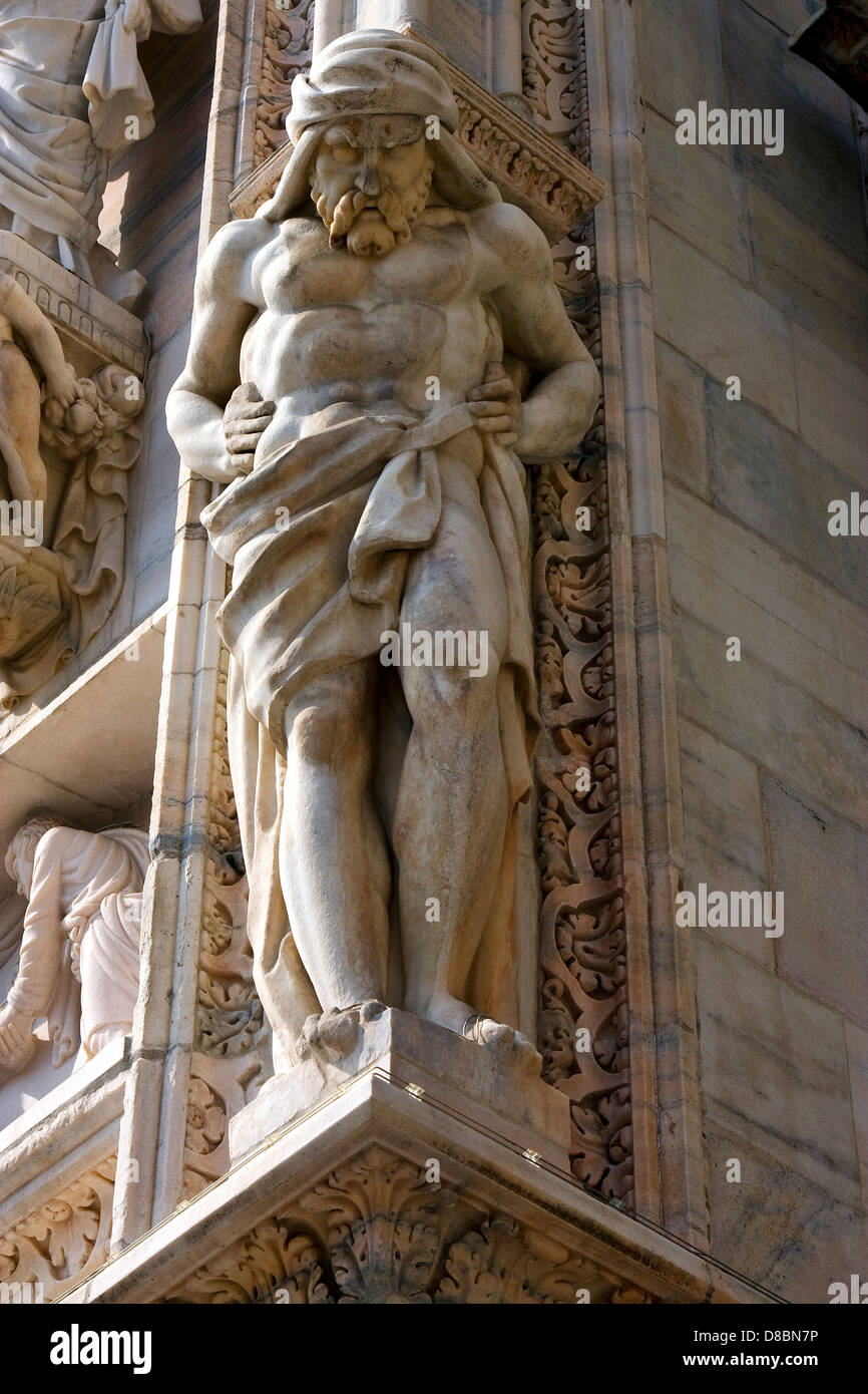 statue of a men in the front of the duomo church in milan italy Stock ...