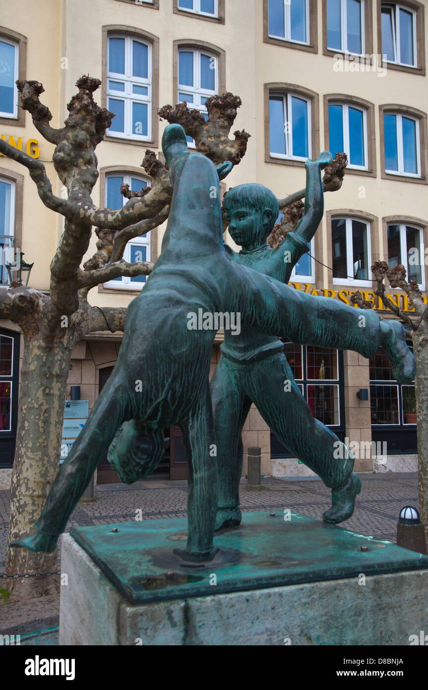 Cartwheelers fountain Burgplatz square Altstadt old town Dusseldorf ...