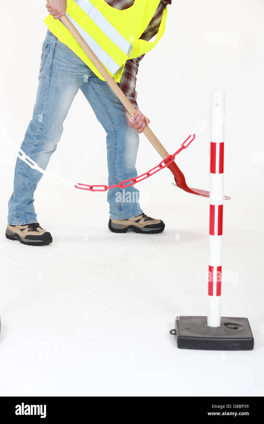 A cropped picture of a road worker Stock Photo - Alamy