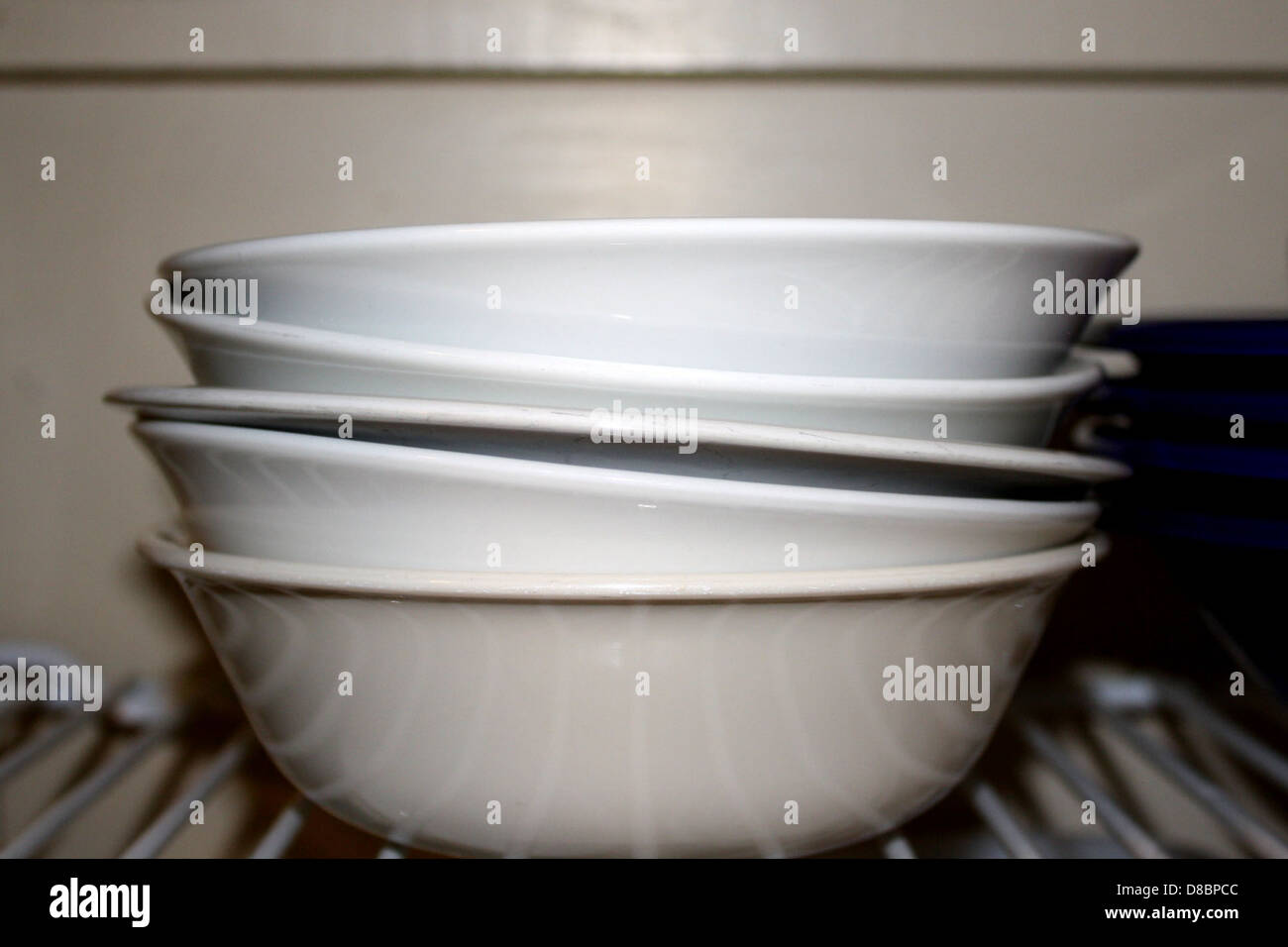 A stack of bowls, typically used for serving or preparing food. This ...