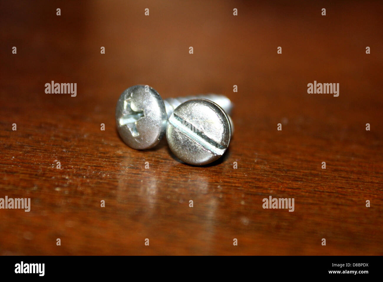 A comparison of standard slotted and Phillips head screws. These screws ...