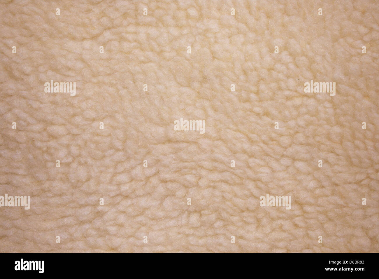tan fleece faux sherpa wool fabric texture Stock Photo - Alamy