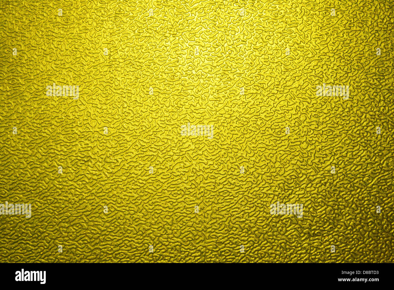 A close-up image of textured yellow plastic, showcasing its pattern and ...