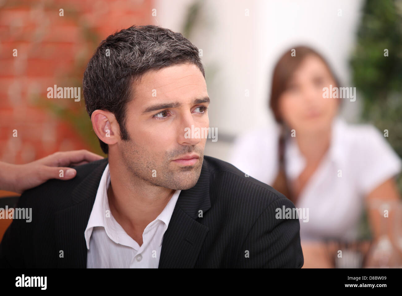 Dejected man looking down hi-res stock photography and images - Alamy