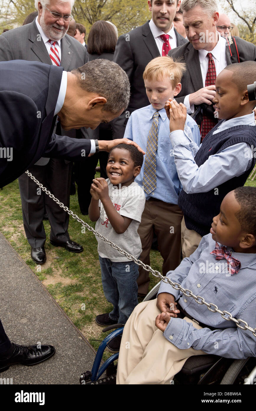 US President Barack Obama greets members of the audience following a ...