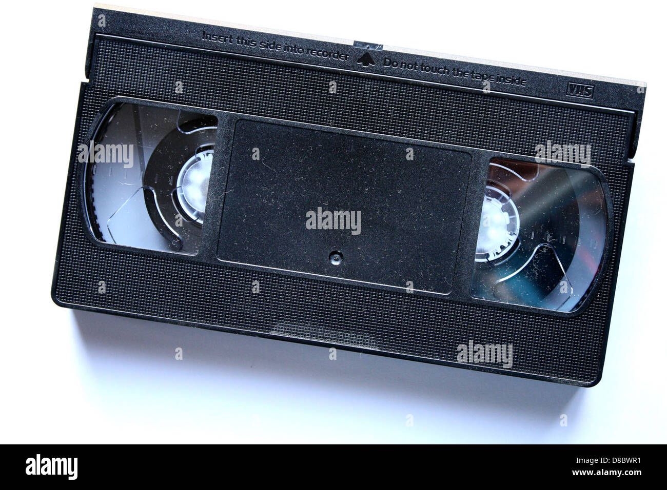 A VHS cassette tape, a popular format for home video recording and ...