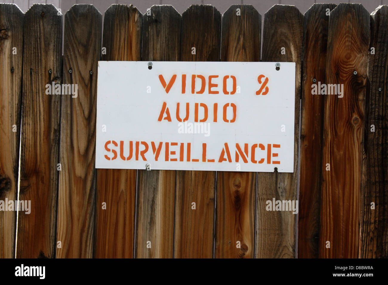 A sign indicating the presence of video and audio surveillance on a ...