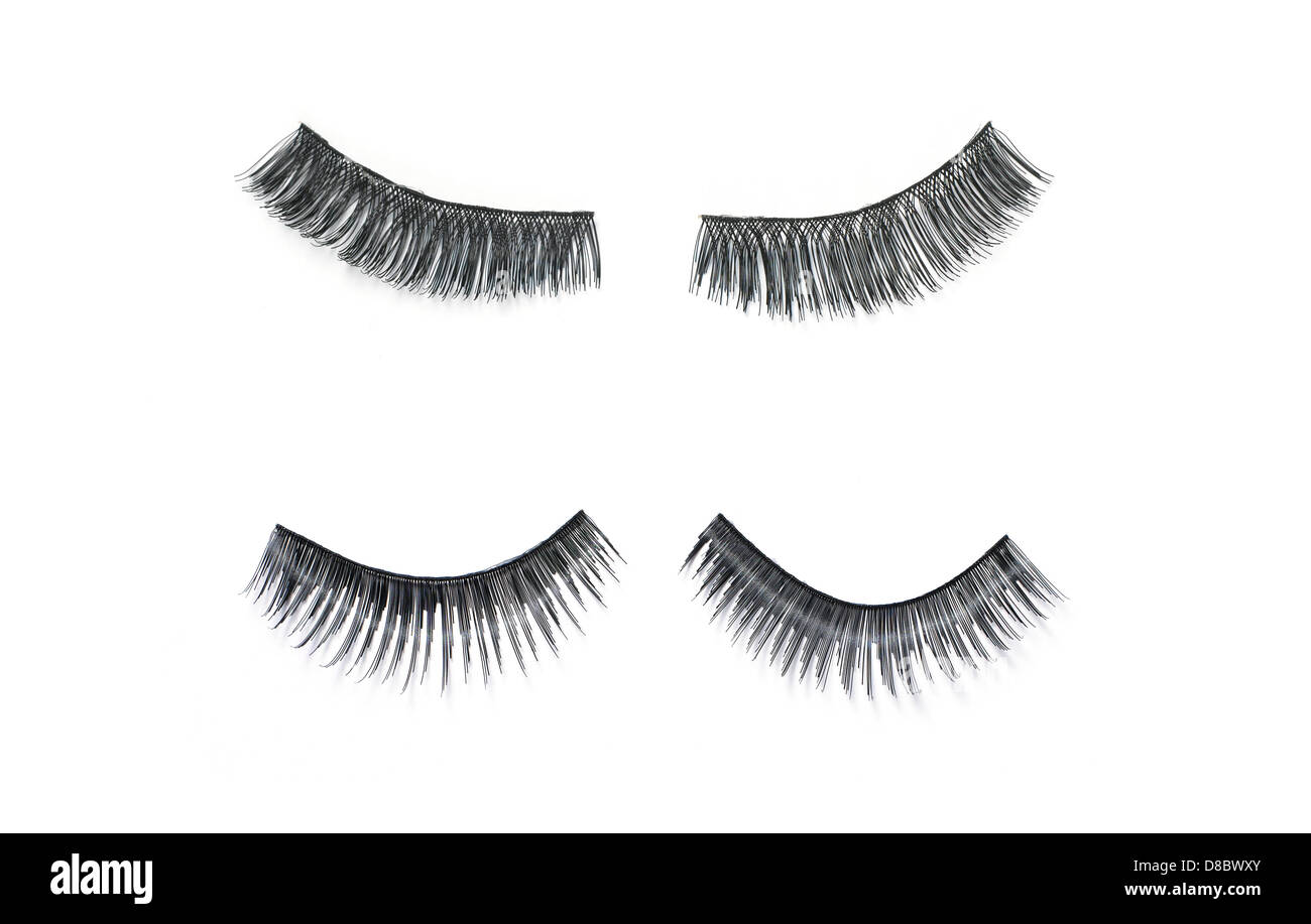 false eyelashes cut out onto a white background Stock Photo - Alamy