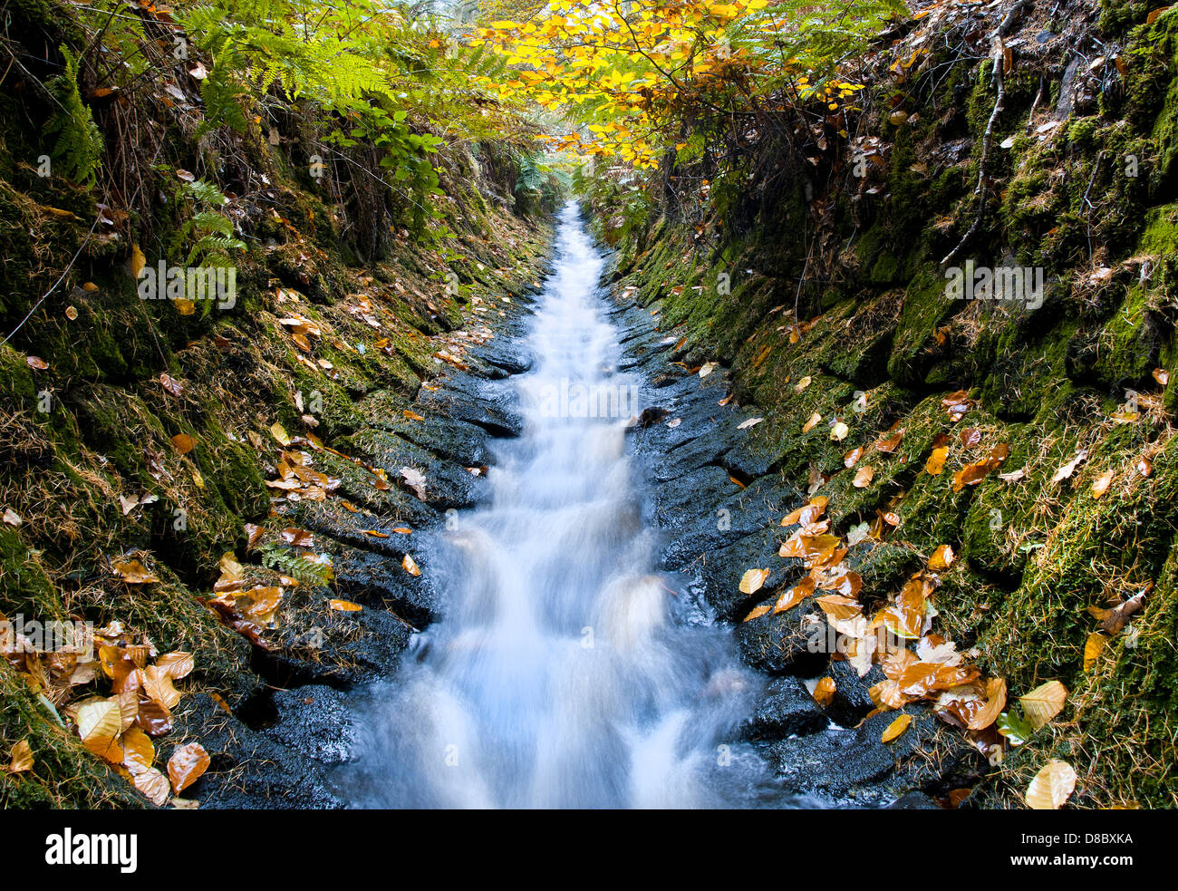 Sheffield - November 2011. Water flowing down the overflow gully from ...