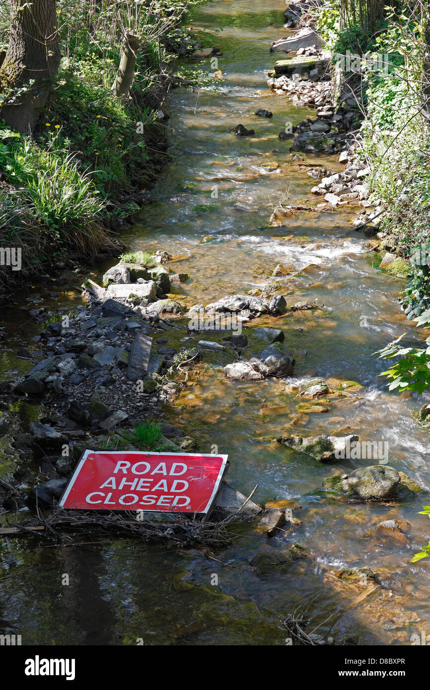 Road ahead closed sign in stream Stock Photo - Alamy