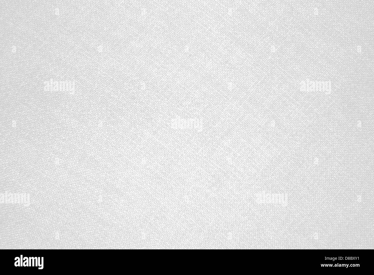 A close-up view of white fabric texture, showing the fine weave and ...