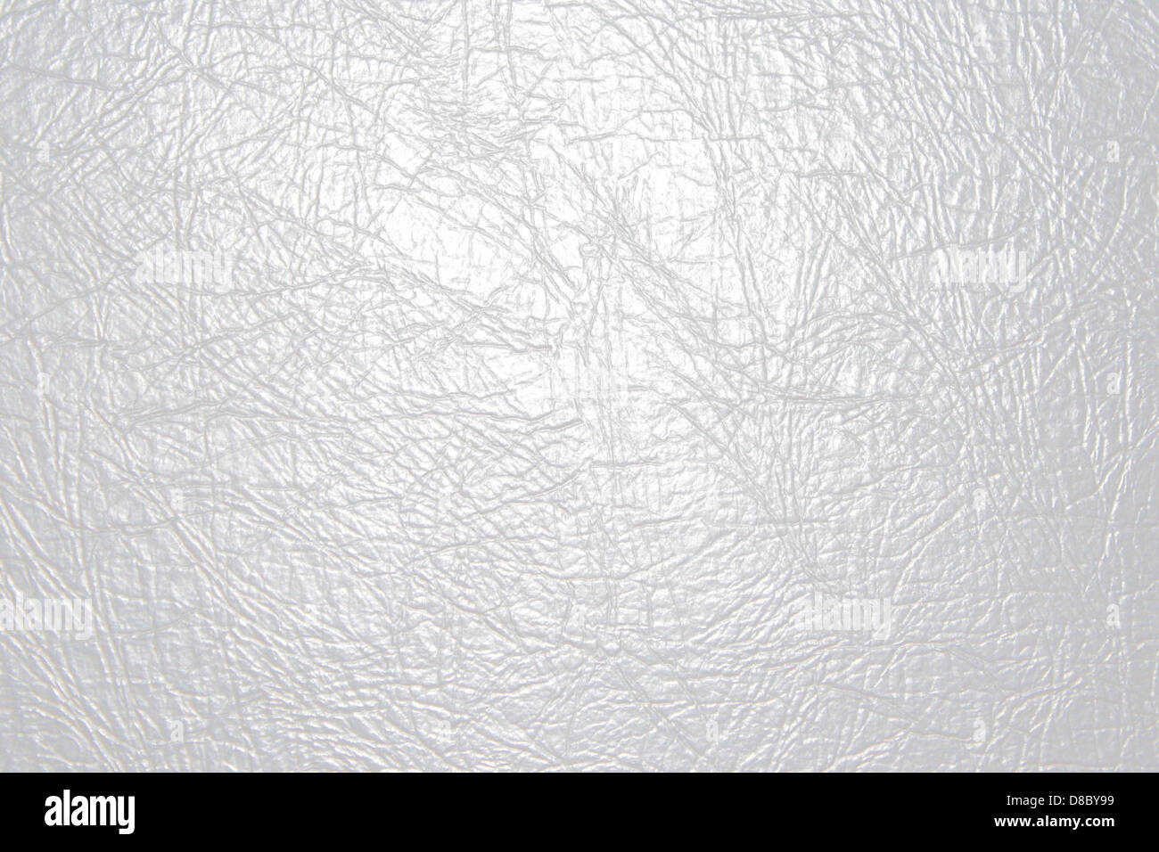 A close-up shot of white leather, showcasing its smooth, fine texture ...
