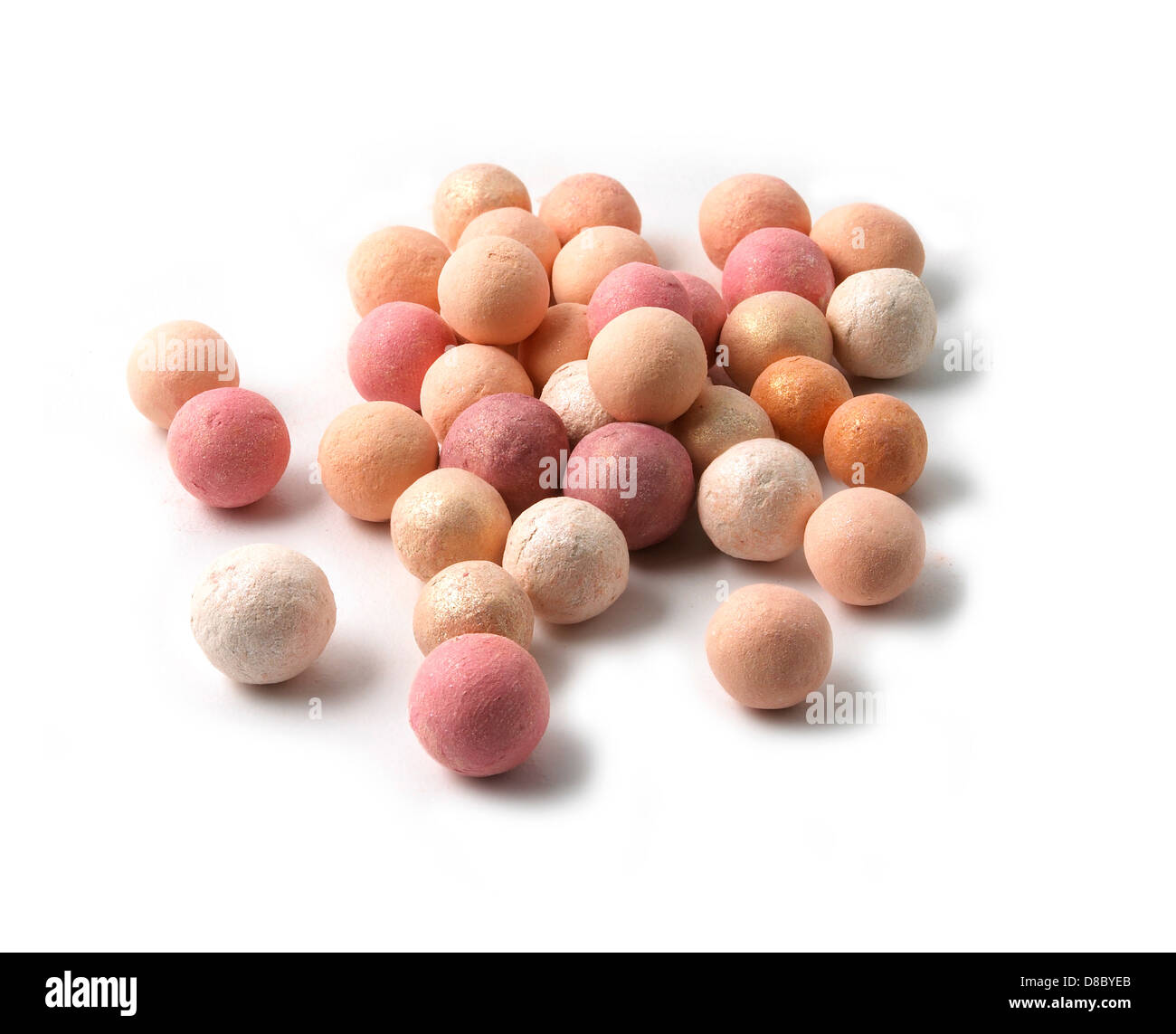 makeup powder balls cut out onto a white background Stock Photo - Alamy