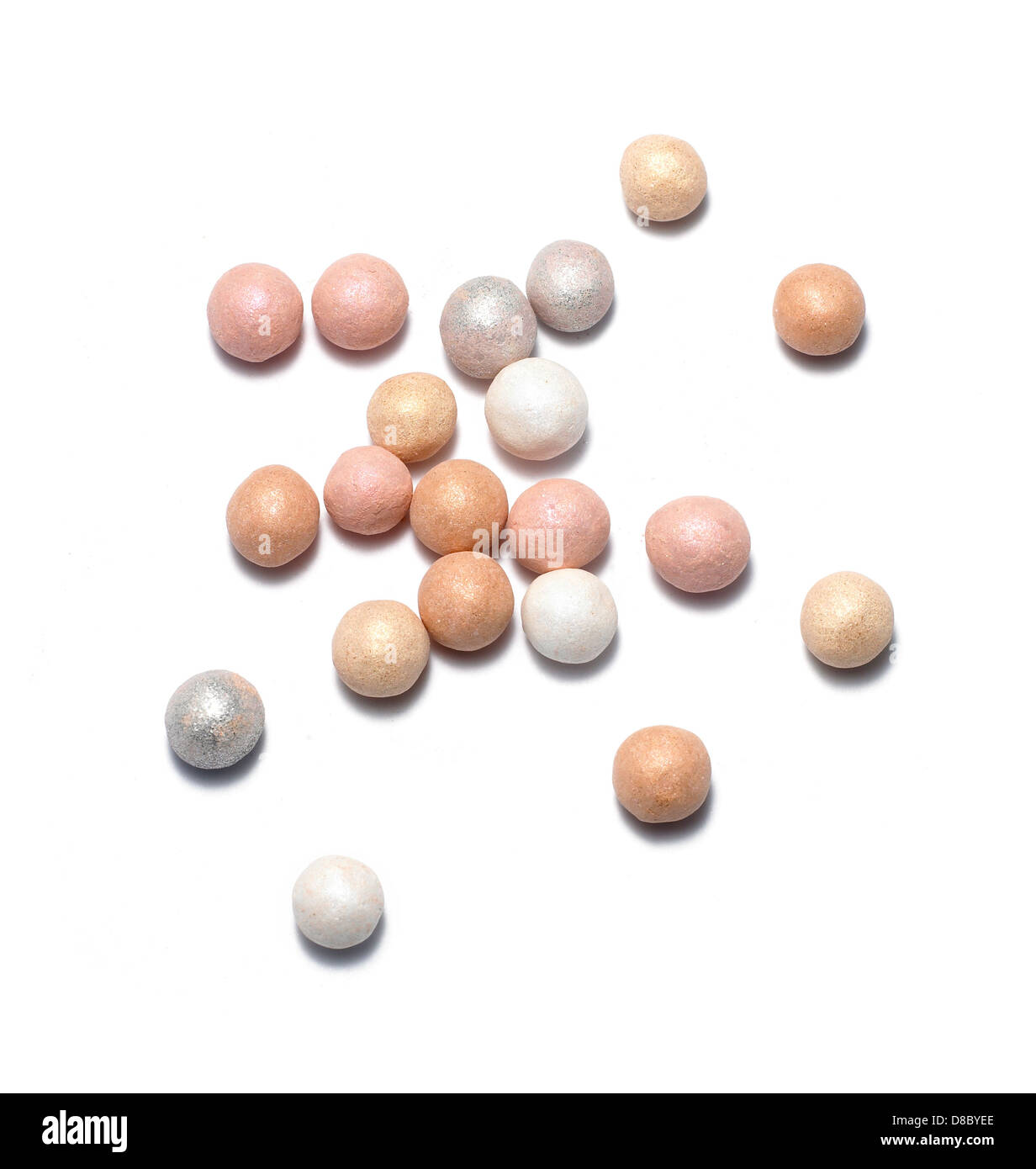 makeup powder balls cut out onto a white background Stock Photo - Alamy
