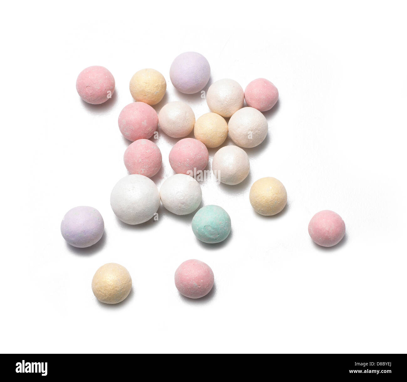 makeup powder balls cut out onto a white background Stock Photo - Alamy