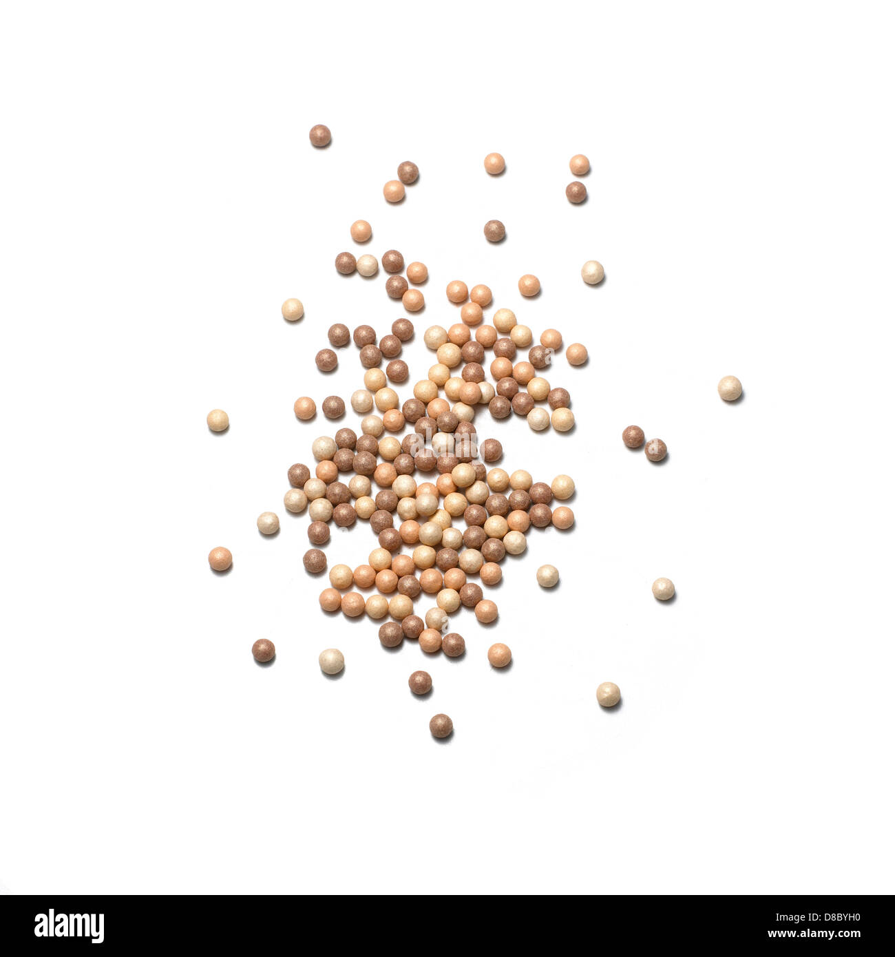 makeup powder balls cut out onto a white background Stock Photo - Alamy