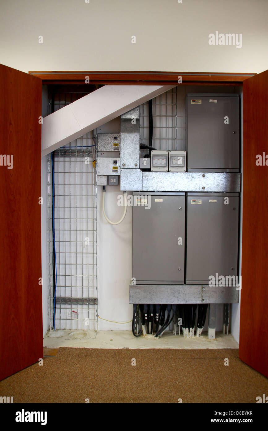 Electrical distribution boards and switchgear in services cupboard in ...