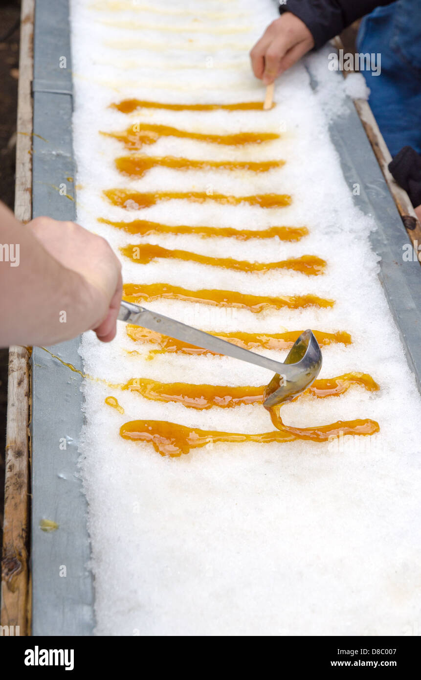 Maple taffy on snow during hi-res stock photography and images - Alamy