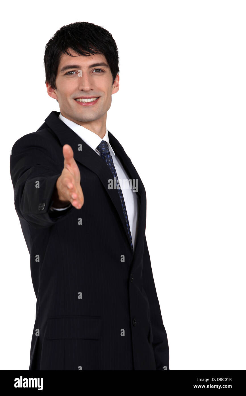 Businessman offer hand Stock Photo - Alamy