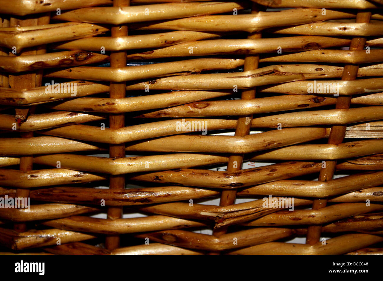 A close-up of a wicker basket, focusing on the texture of the woven ...