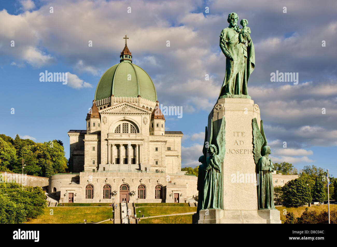 St.Joseph Oratory and St.Joseph monument, at sunset, with cloudy sky ...