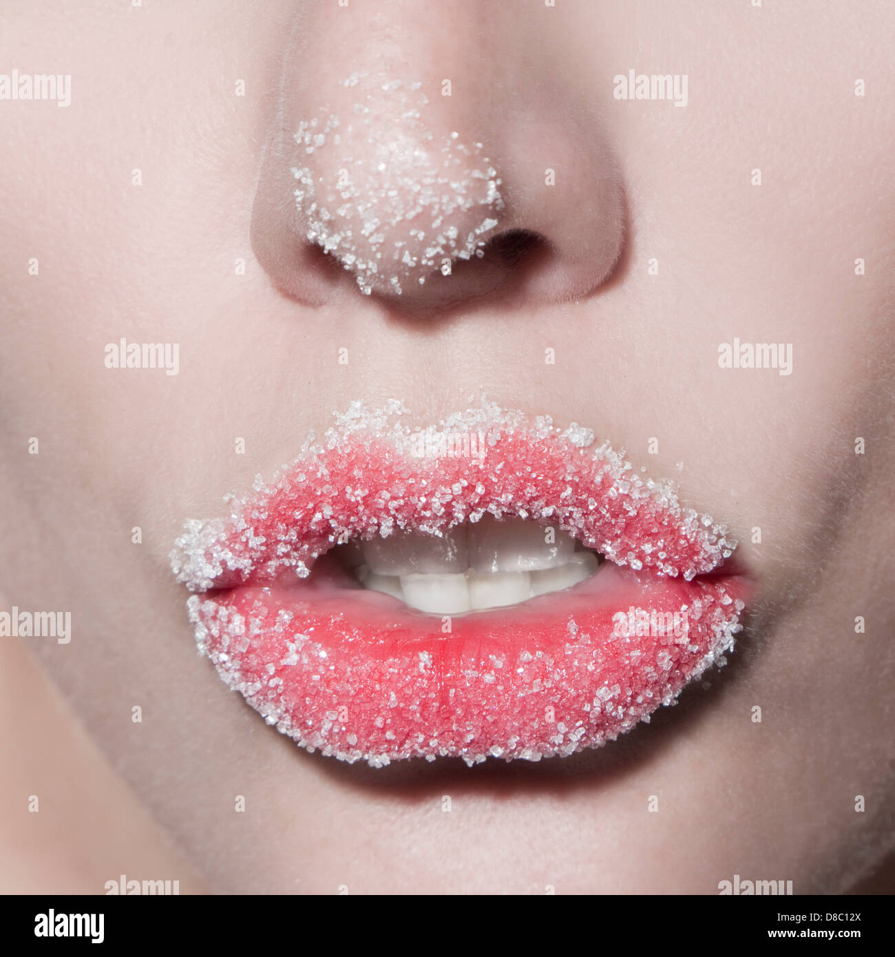 Woman with salt on lips and nose Stock Photo - Alamy
