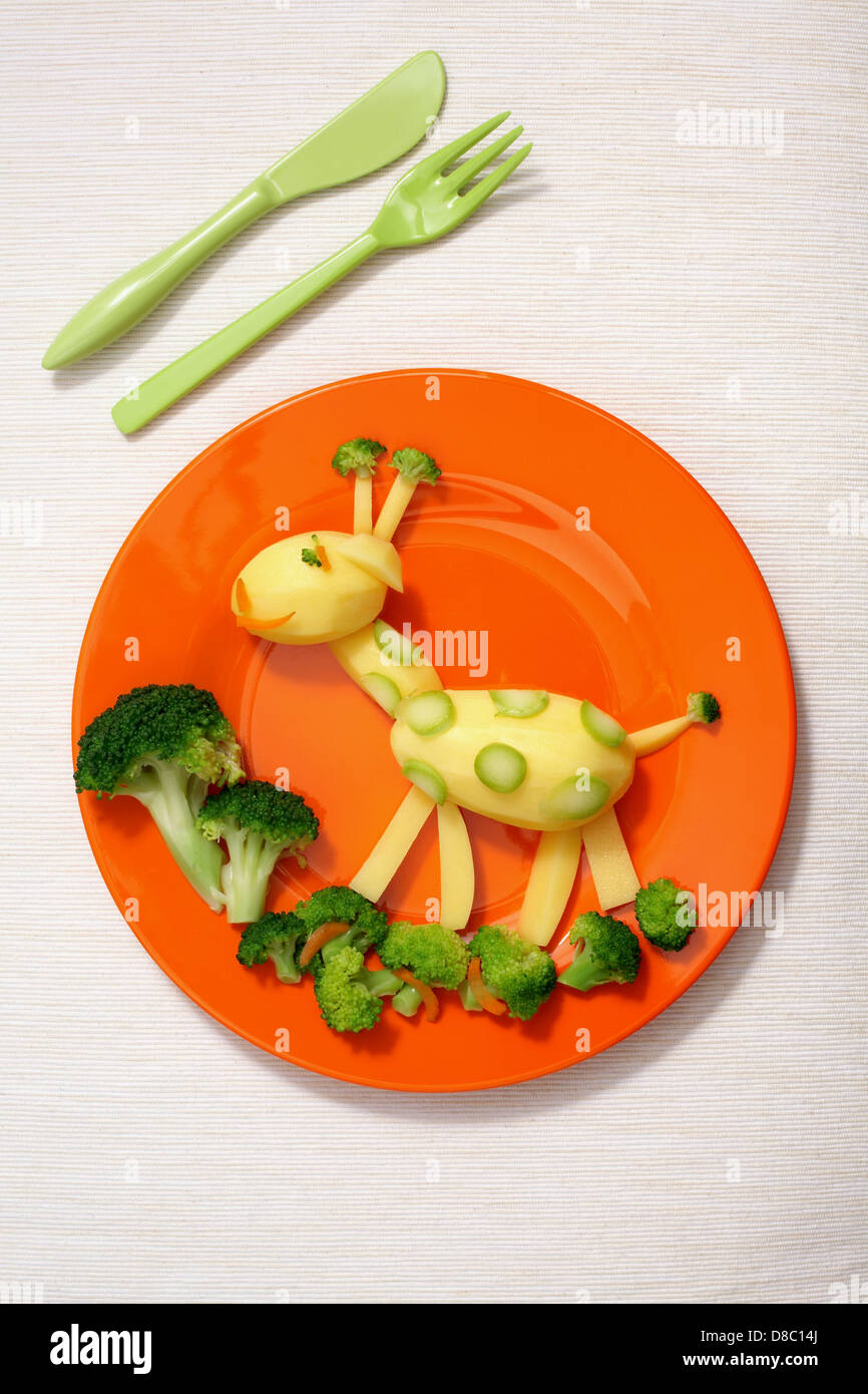 Children's plate with potatoes and broccoli in shape of a giraffe Stock ...
